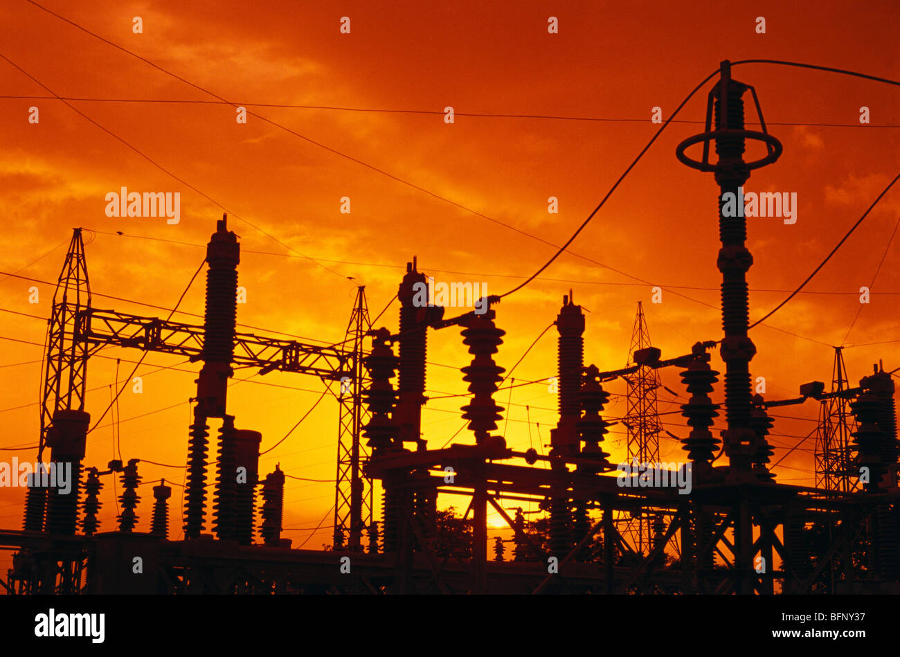 Electricity power lines in silhouette Stock Photo - Alamy