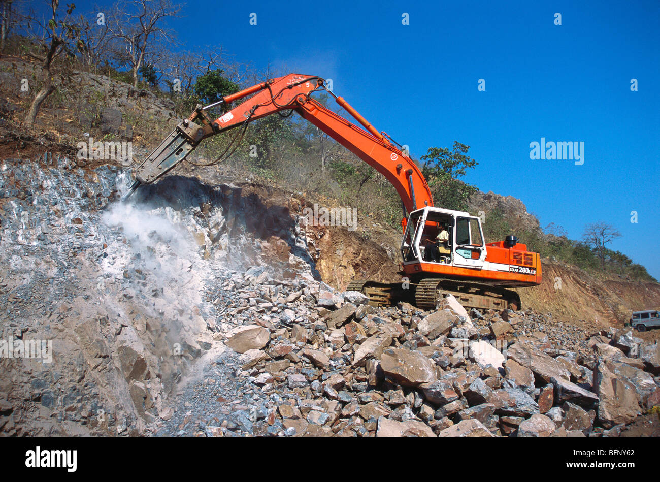 Excavator ; heavy construction equipment ; boom ; dipper ; bucket ; cab ...