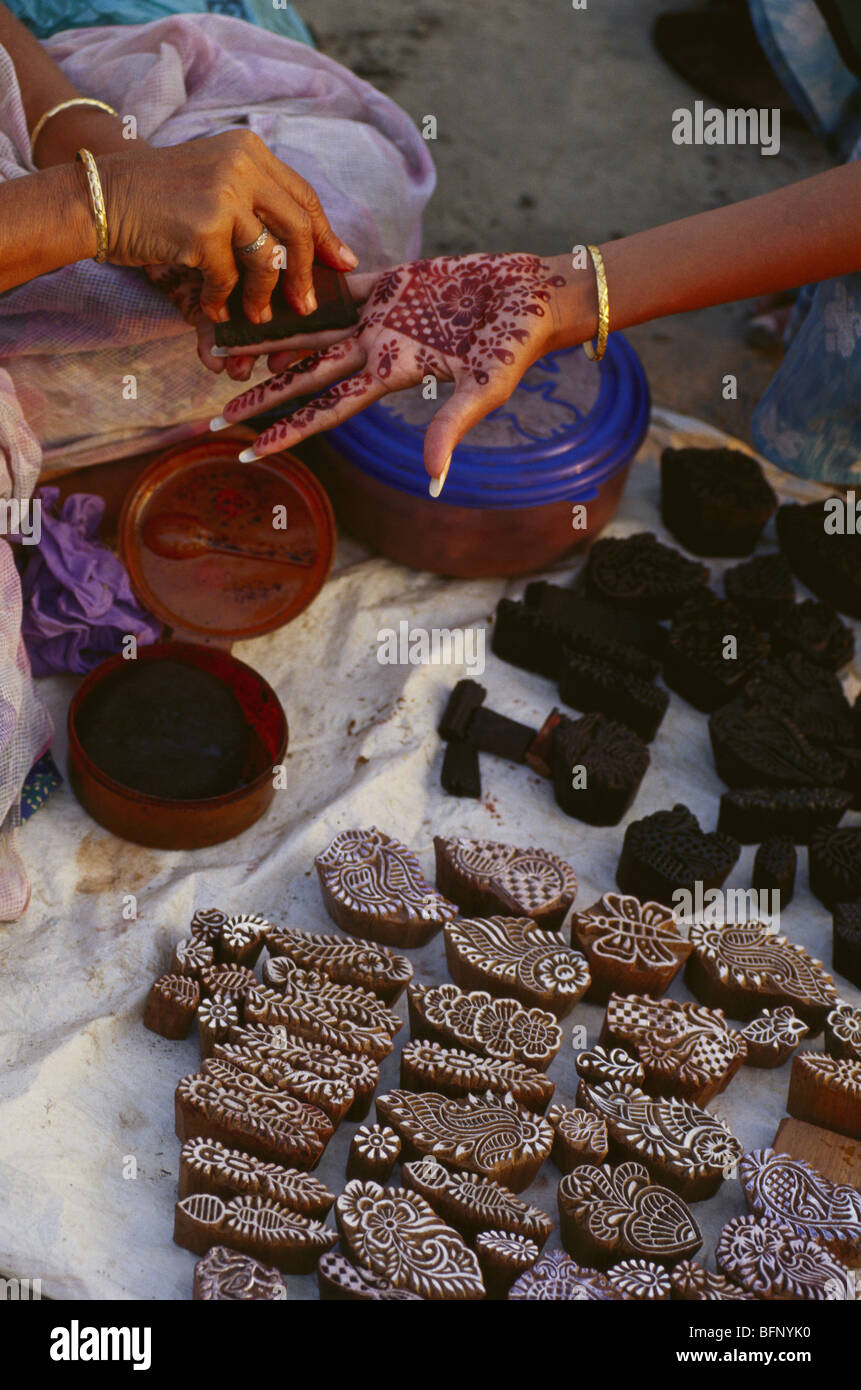 Mehndi henna application with blocks Stock Photo - Alamy