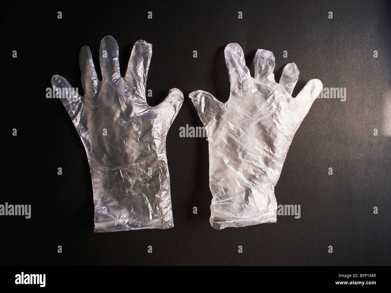 Hand gloves of plastic ; India ; asia Stock Photo - Alamy