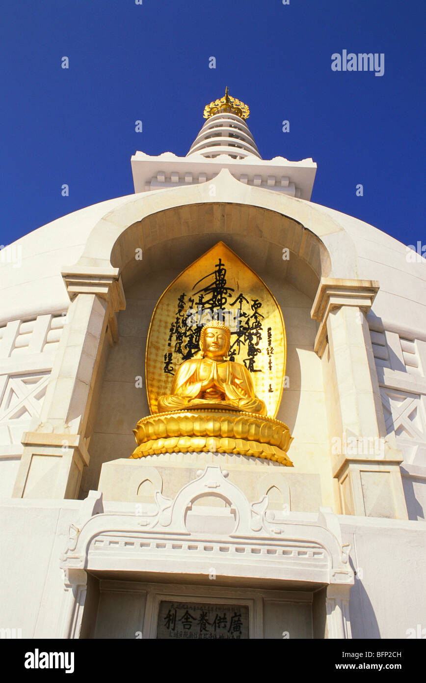 Gilded statue of Buddha ; Vishwa Shanti Stupa ; Rajgir ; Bihar ; India ...