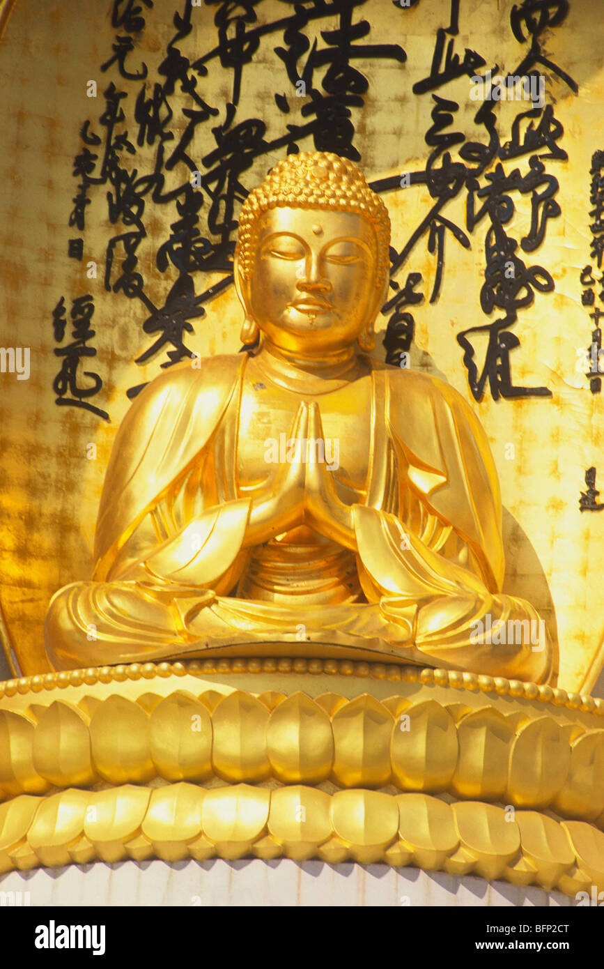 Gilded statue of Buddha, Vishwa Shanti Stupa, Rajgir, Bihar, India ...