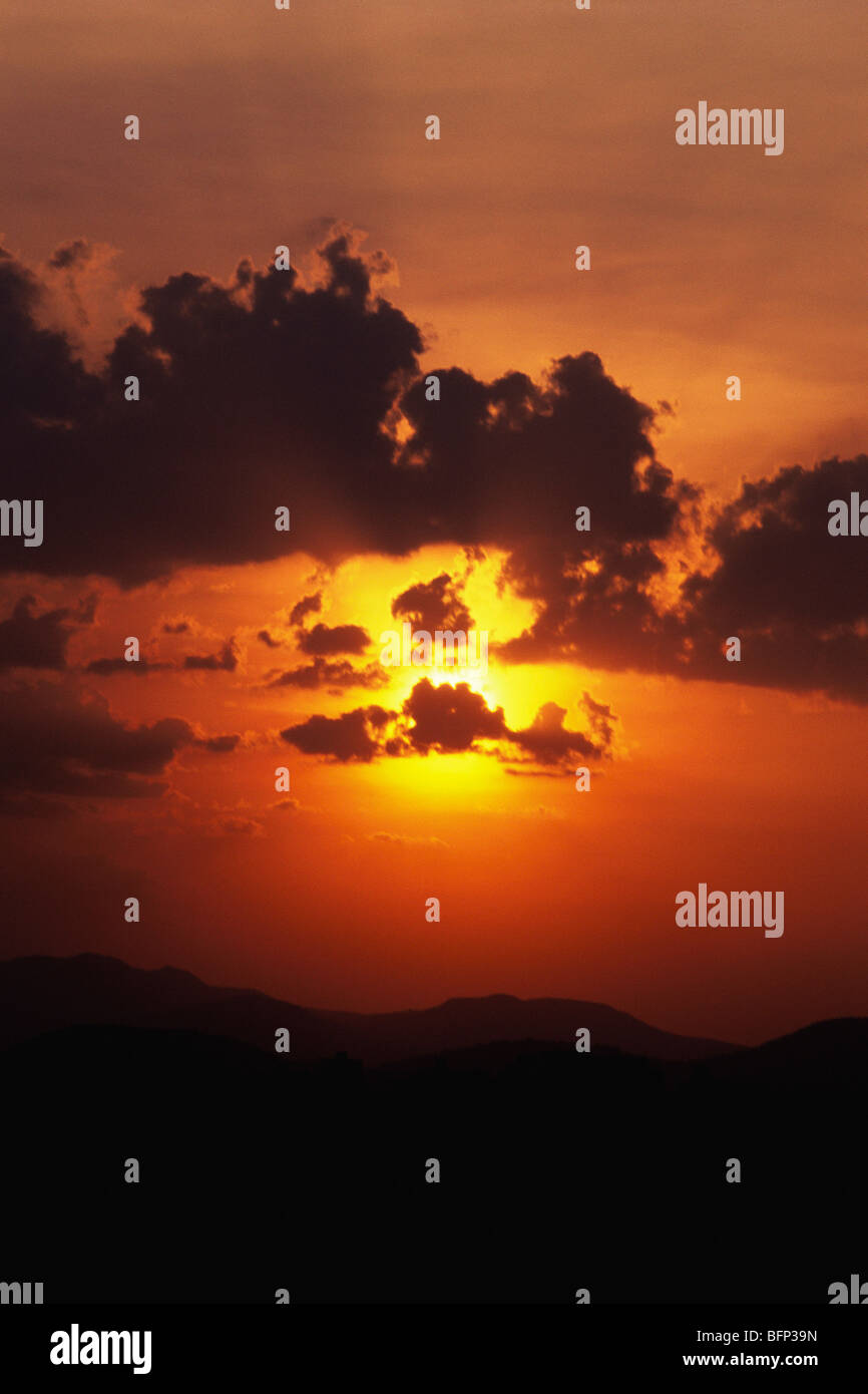 NMK 63340 : Colourful sky black clouds with mountain at sunset ; Pune ...