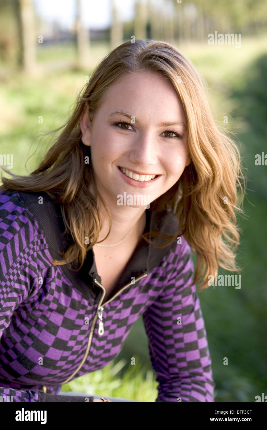 Outside park portrait smile smiling teenager white woman hi-res stock ...