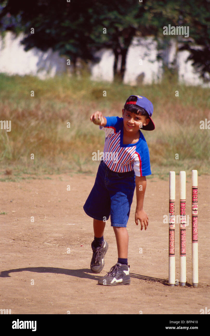 Indian child boy playing cricket bowling ; India ; asia ; MR#158 Stock ...