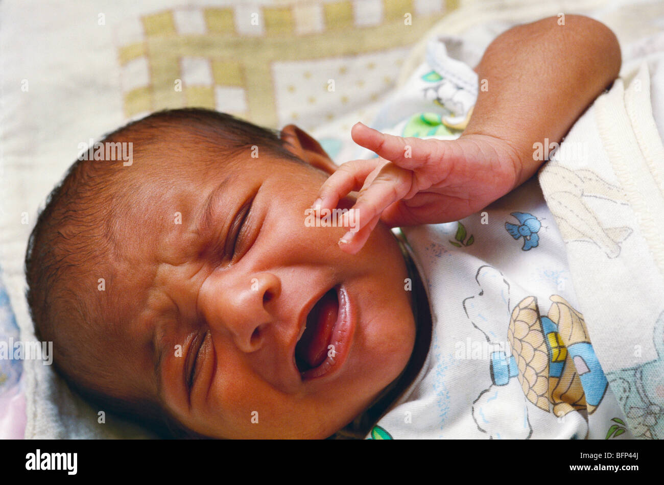 Indian baby crying hi-res stock photography and images - Alamy