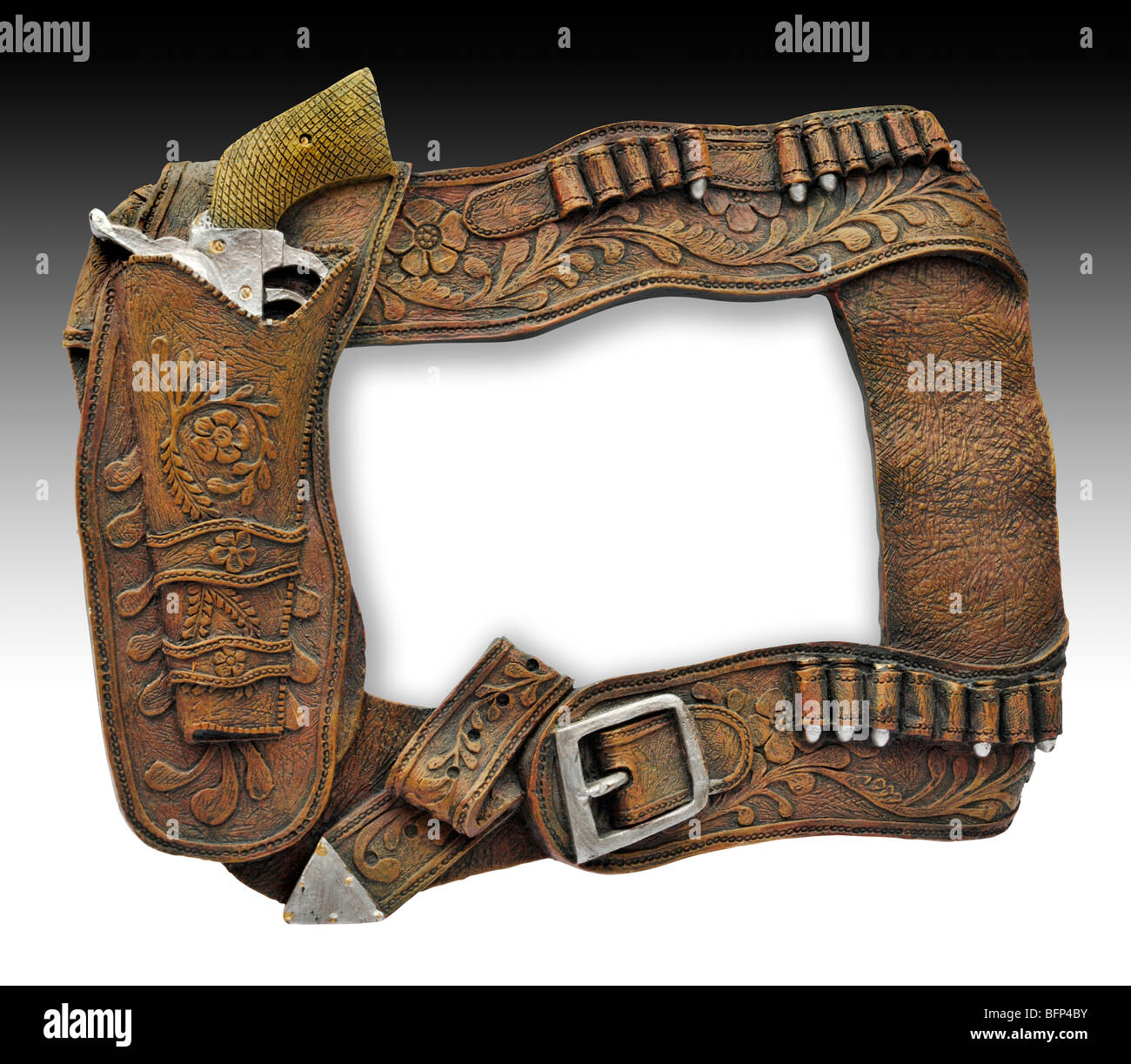 Picture frame made up of cowboy gun-belt, bullets gun and holster on ...