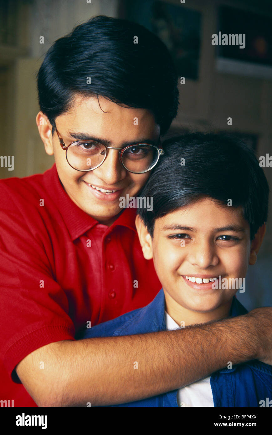 Indian two friends hugging smiling hi-res stock photography and images ...