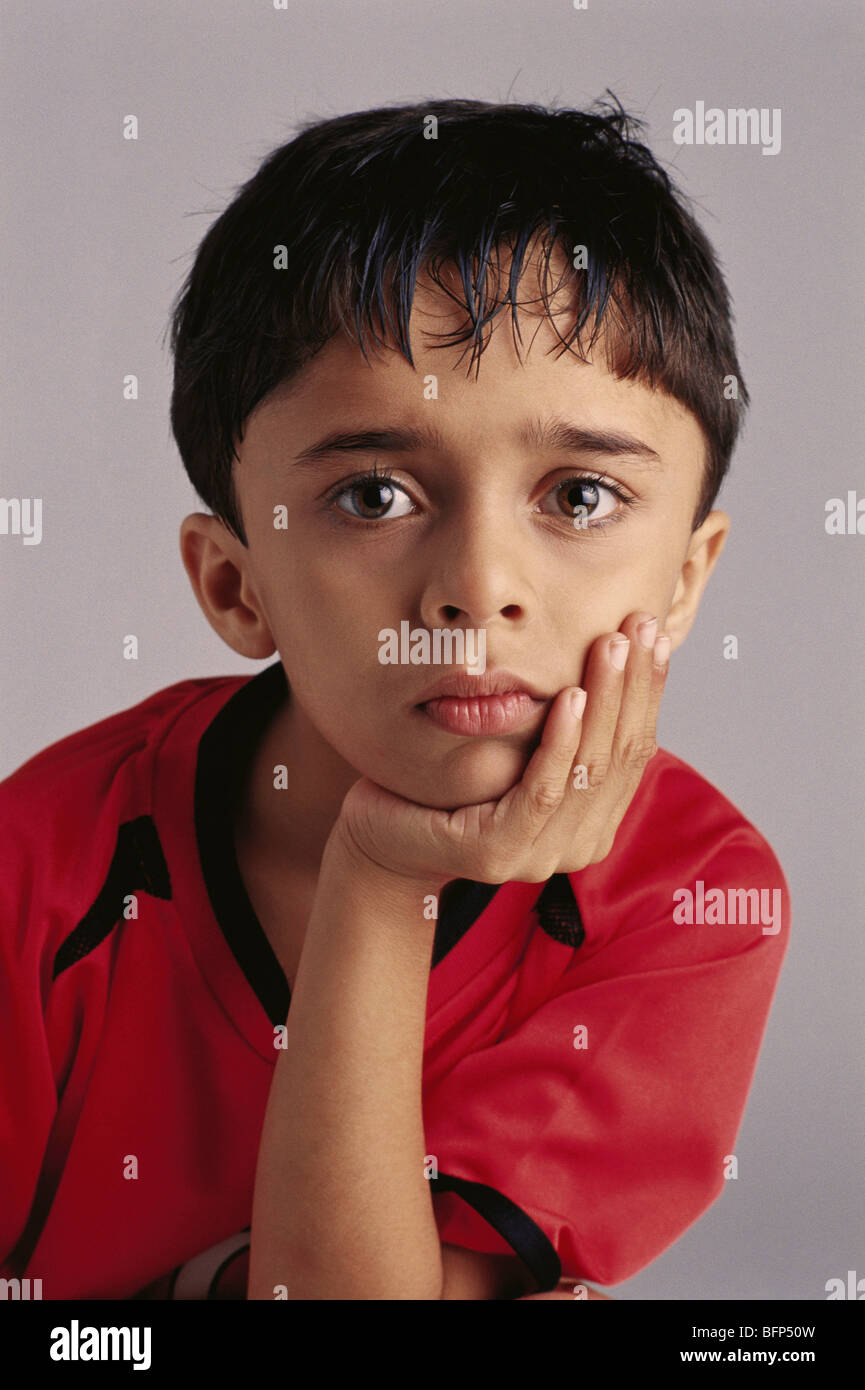 Boy thinking serious MR#496 Stock Photo - Alamy