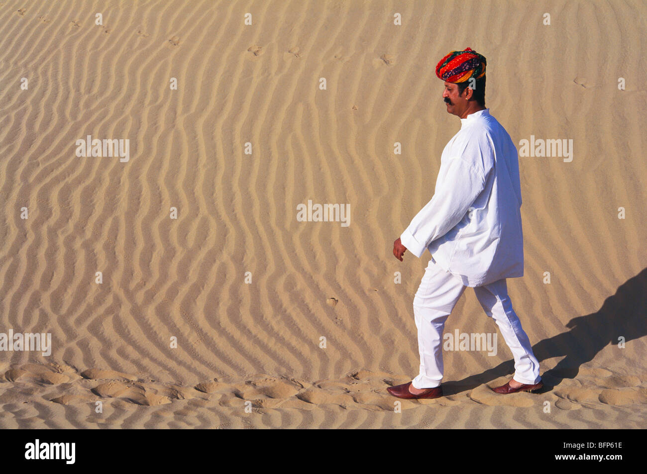 MMN 63962 : Rajasthani rajput man crossing sam dunes ; Jaisalmer ...