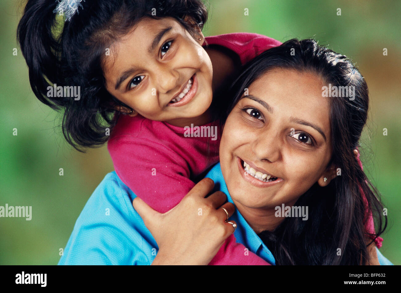Indian child daughter hugging mother ; india ; asia ; MR#152 Stock ...