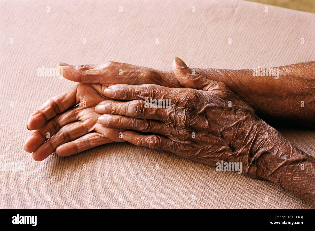Indian senior old woman wrinkles hands ; India ; asia Stock Photo - Alamy