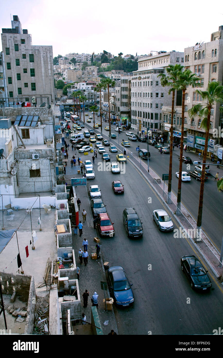 Street traffic with cars on the road in the capital city of Amman ...