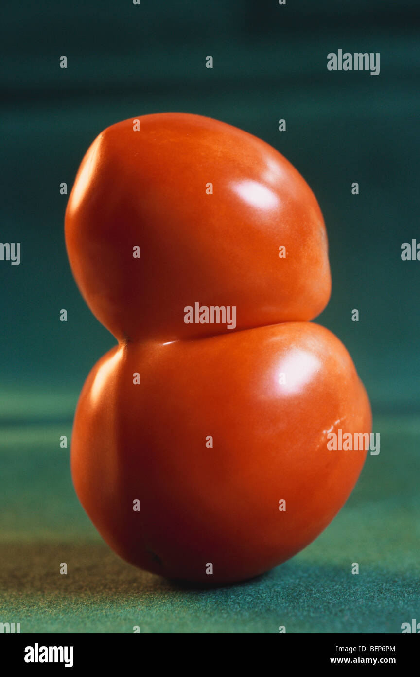 Tomato funny shape twins hi-res stock photography and images - Alamy