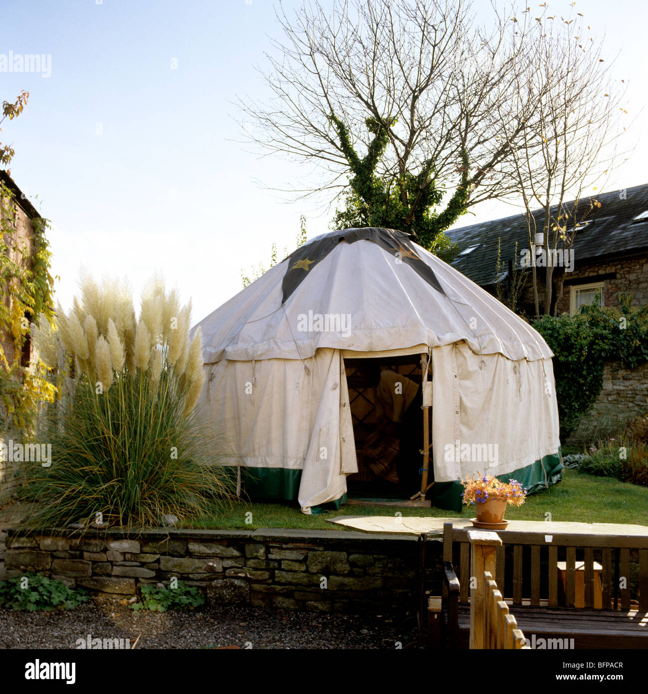 Exterior of yurt / ger / tent in a garden Stock Photo - Alamy