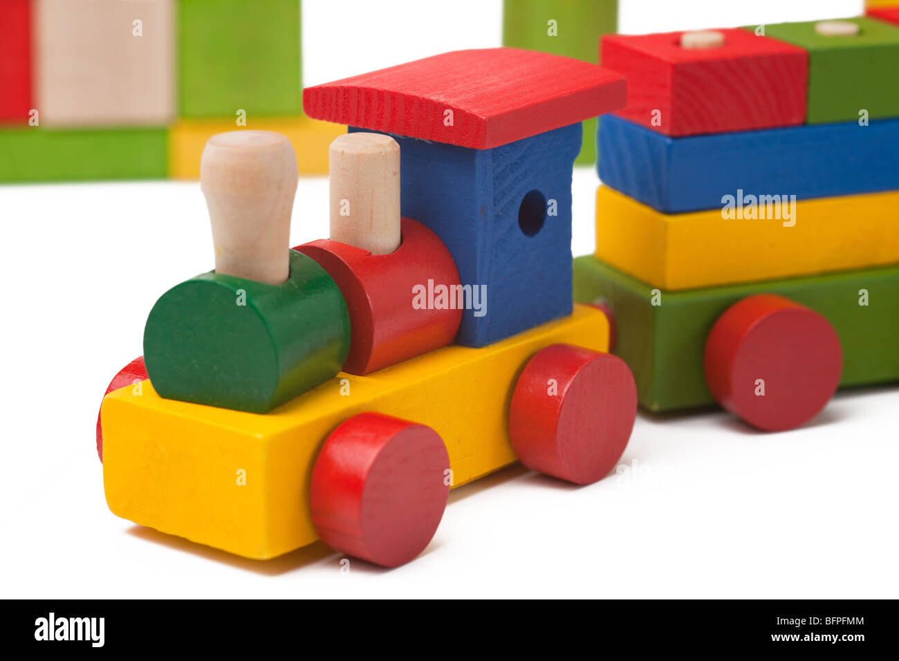 Colorful toy train isolated on white background Stock Photo - Alamy