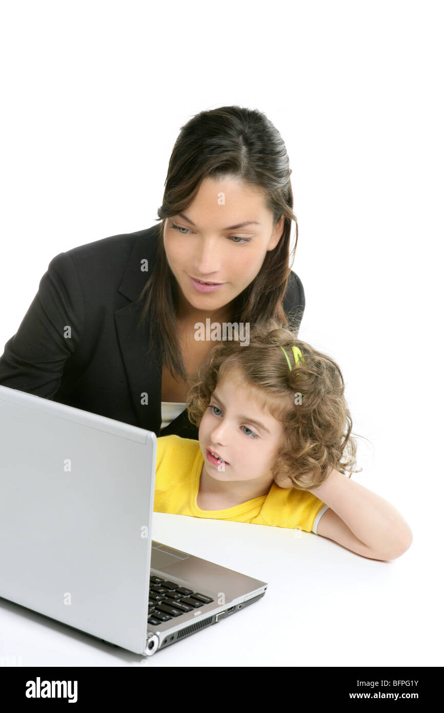 Beautiful mother and daughter with laptop computer on white background ...