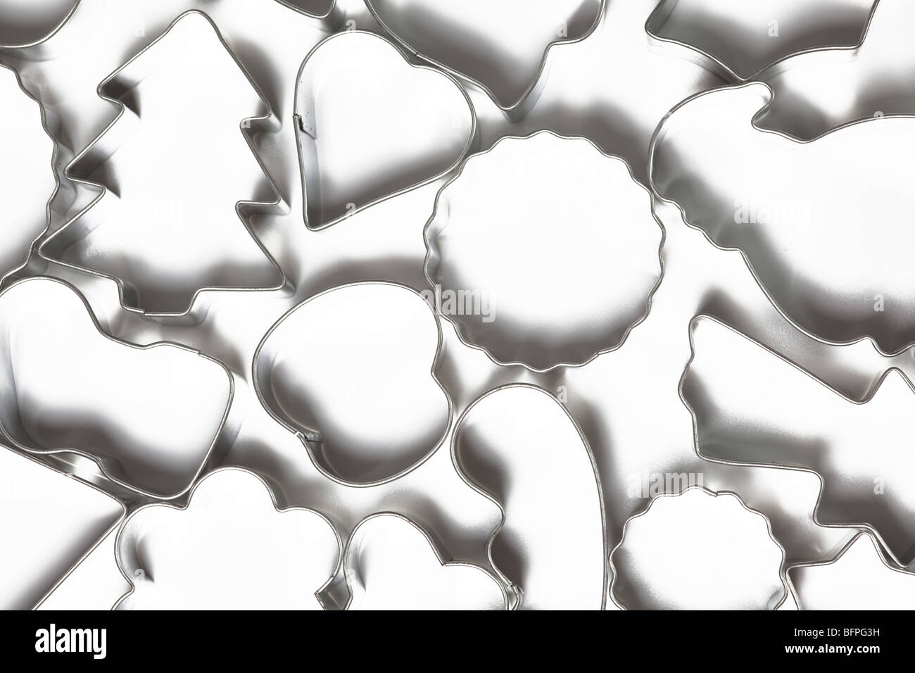 cookie cutters on white background Stock Photo - Alamy