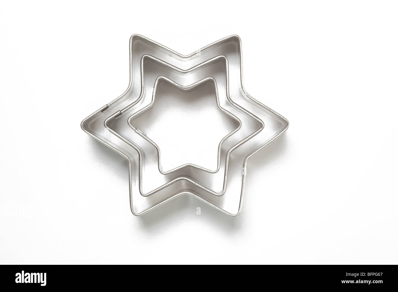 cookie cutters on white background Stock Photo - Alamy