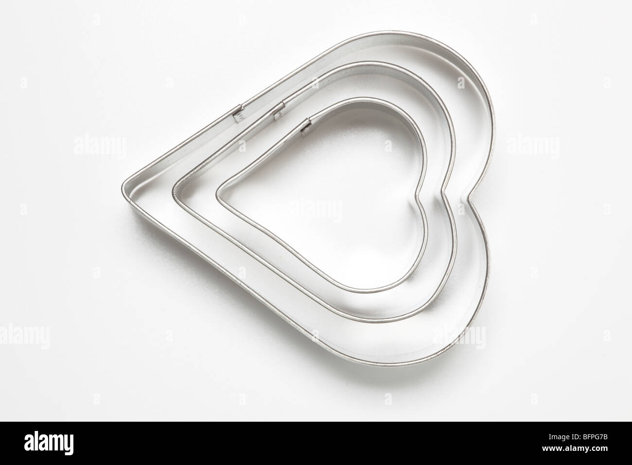 cookie cutters on white background Stock Photo - Alamy