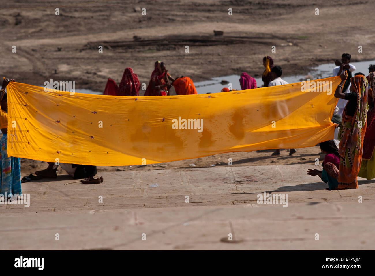 Women drying saree hi-res stock photography and images - Alamy