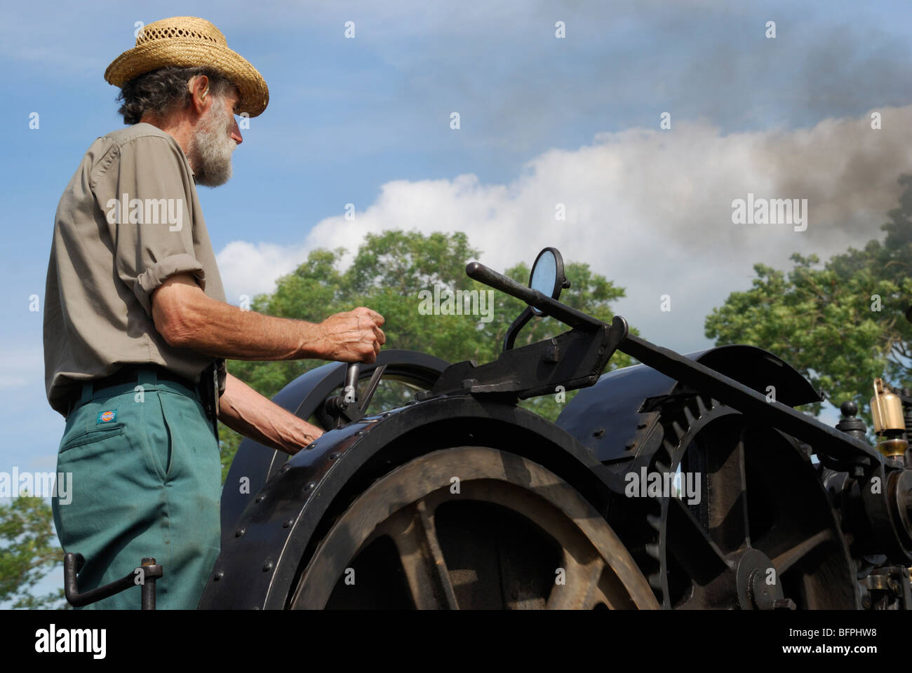 A man driving a steam traction engine, Wymeswold, Leicestershire ...