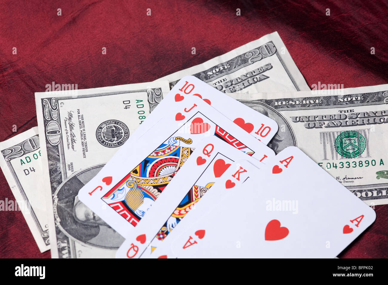poker cards and american money Stock Photo - Alamy