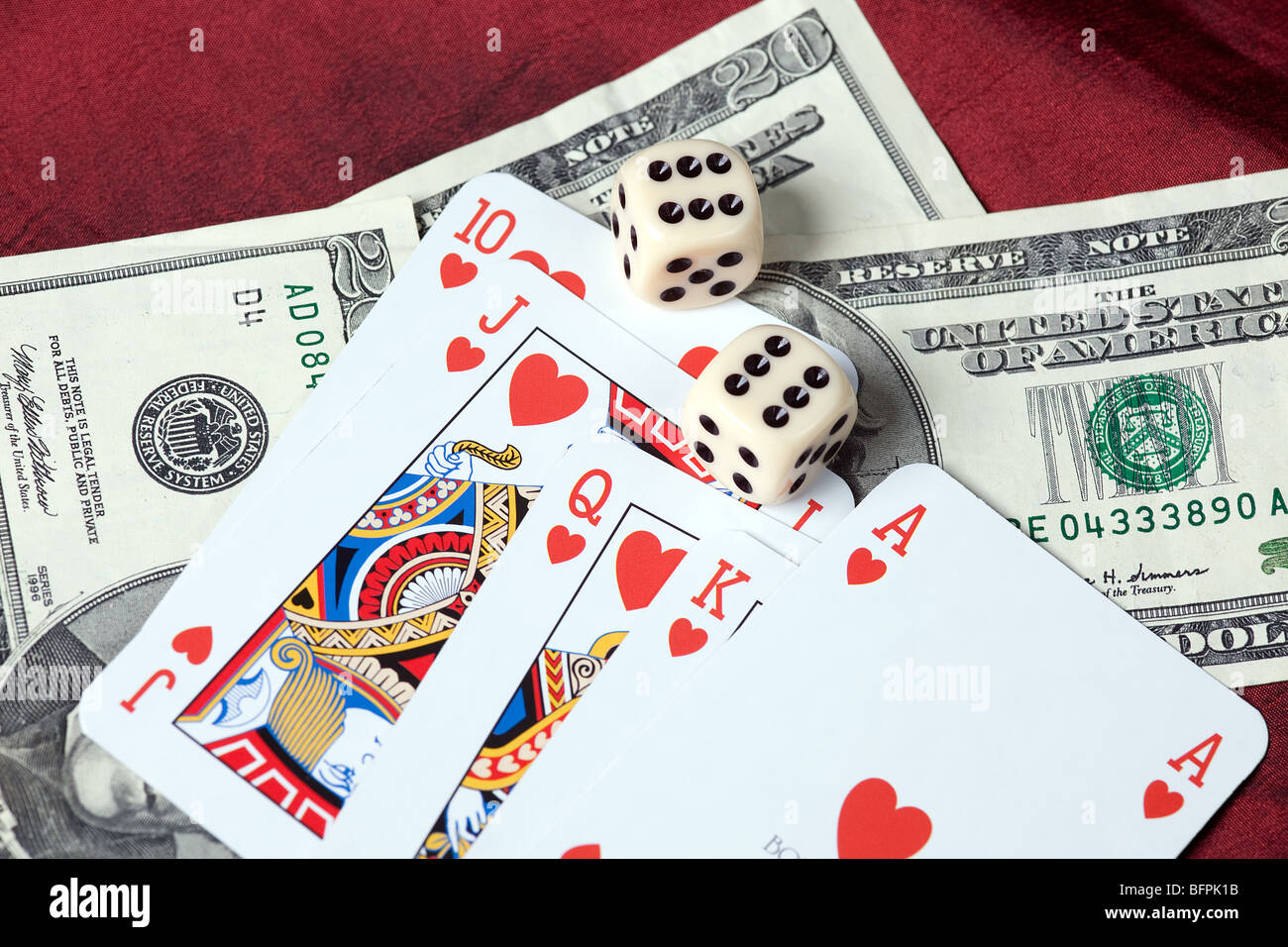 poker cards and american money Stock Photo - Alamy