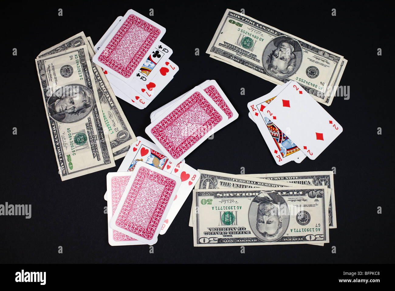 poker cards and american money Stock Photo - Alamy