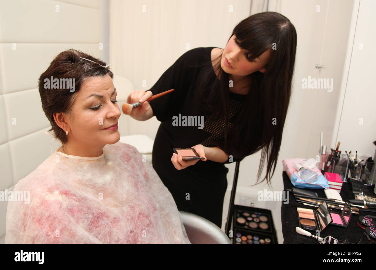 Girl having her make up done hi-res stock photography and images - Alamy