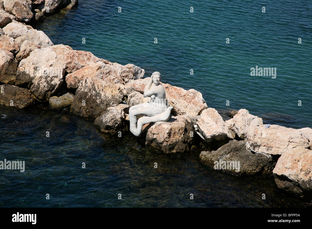 Mermaid on rock hi-res stock photography and images - Alamy