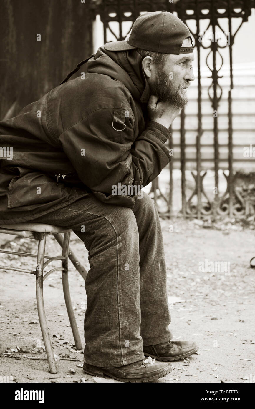 Homeless man on a city street Stock Photo - Alamy