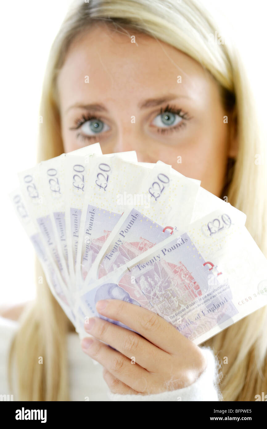 Teenage Girl Holding Fan of Cash. Model Released Stock Photo - Alamy