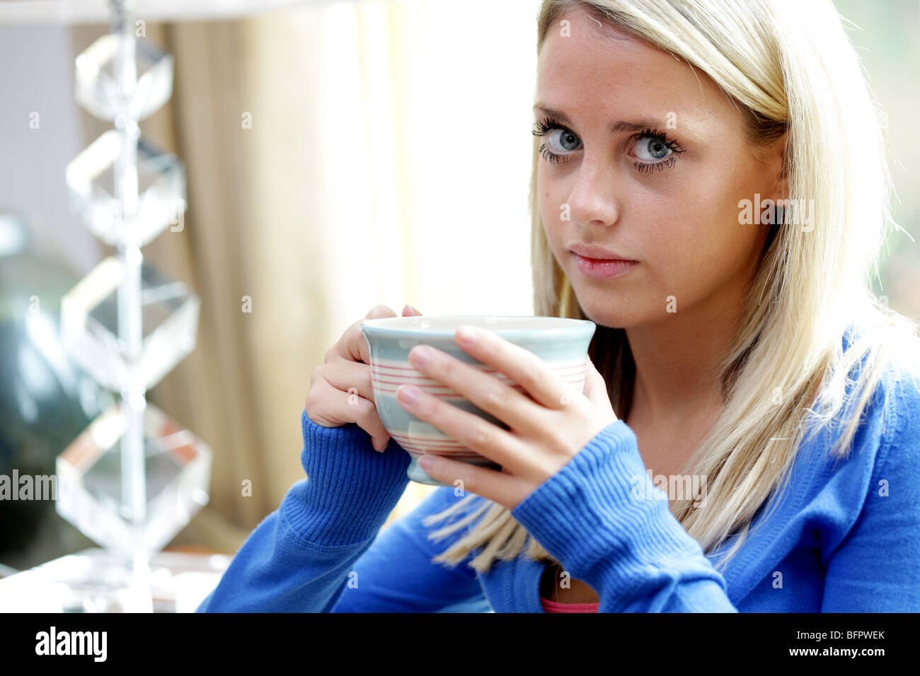Teenage Girl Drinking Coffee. Model Released Stock Photo - Alamy