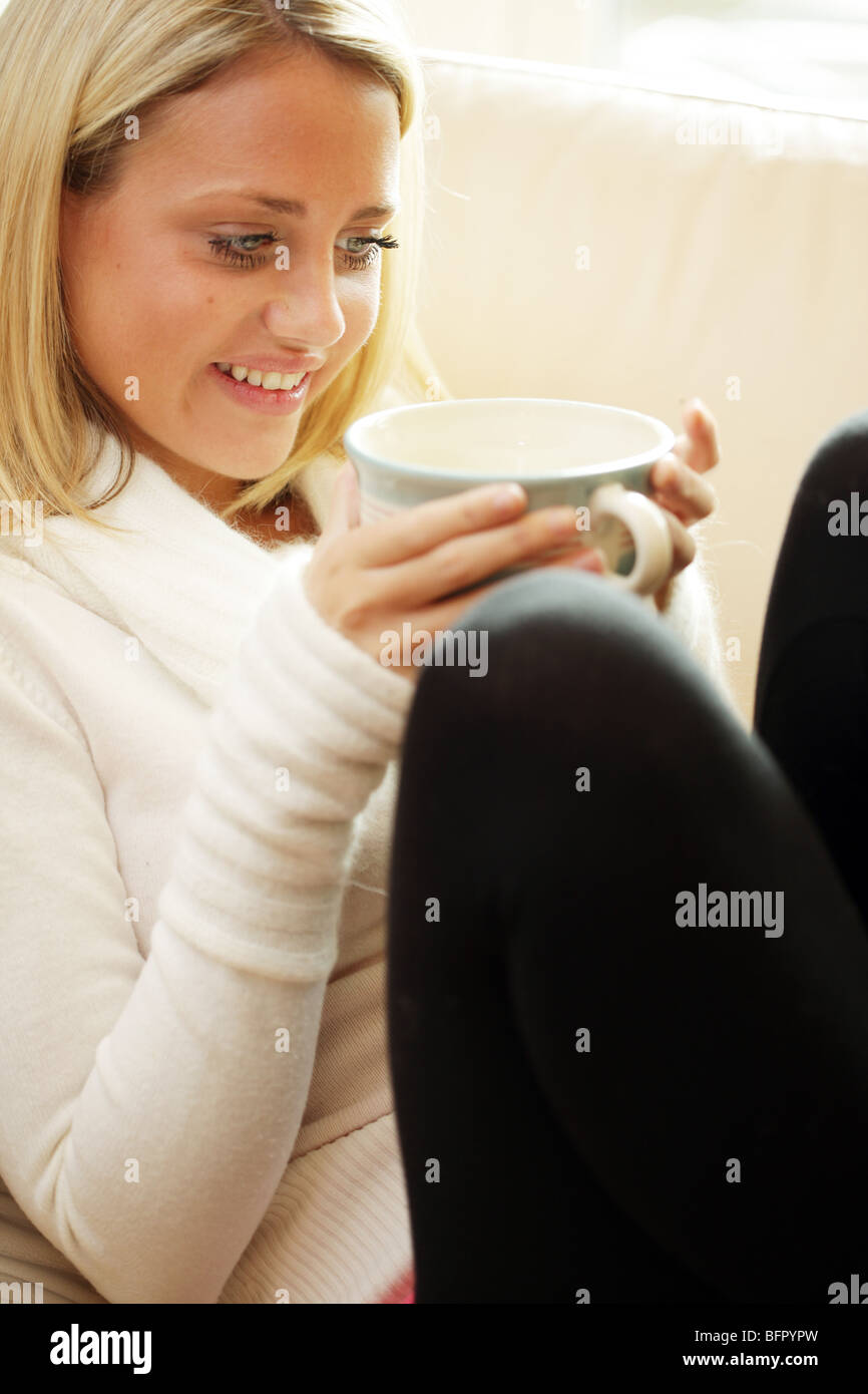 Teenage Girl Drinking Cup of Tea. Model Released Stock Photo - Alamy