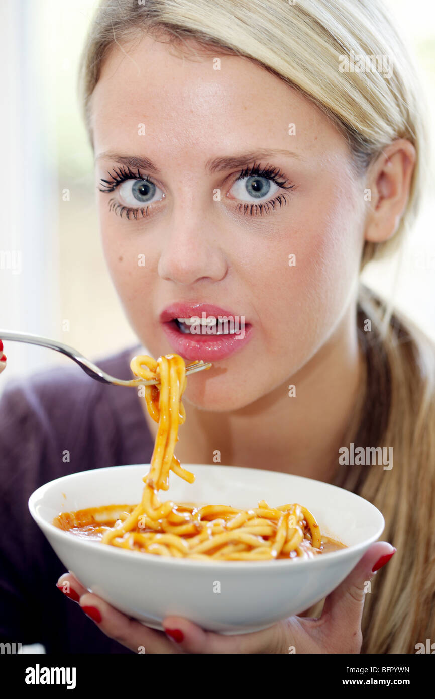 Teenage Girl Eating Spaghetti Bologneise. Model Released Stock Photo ...