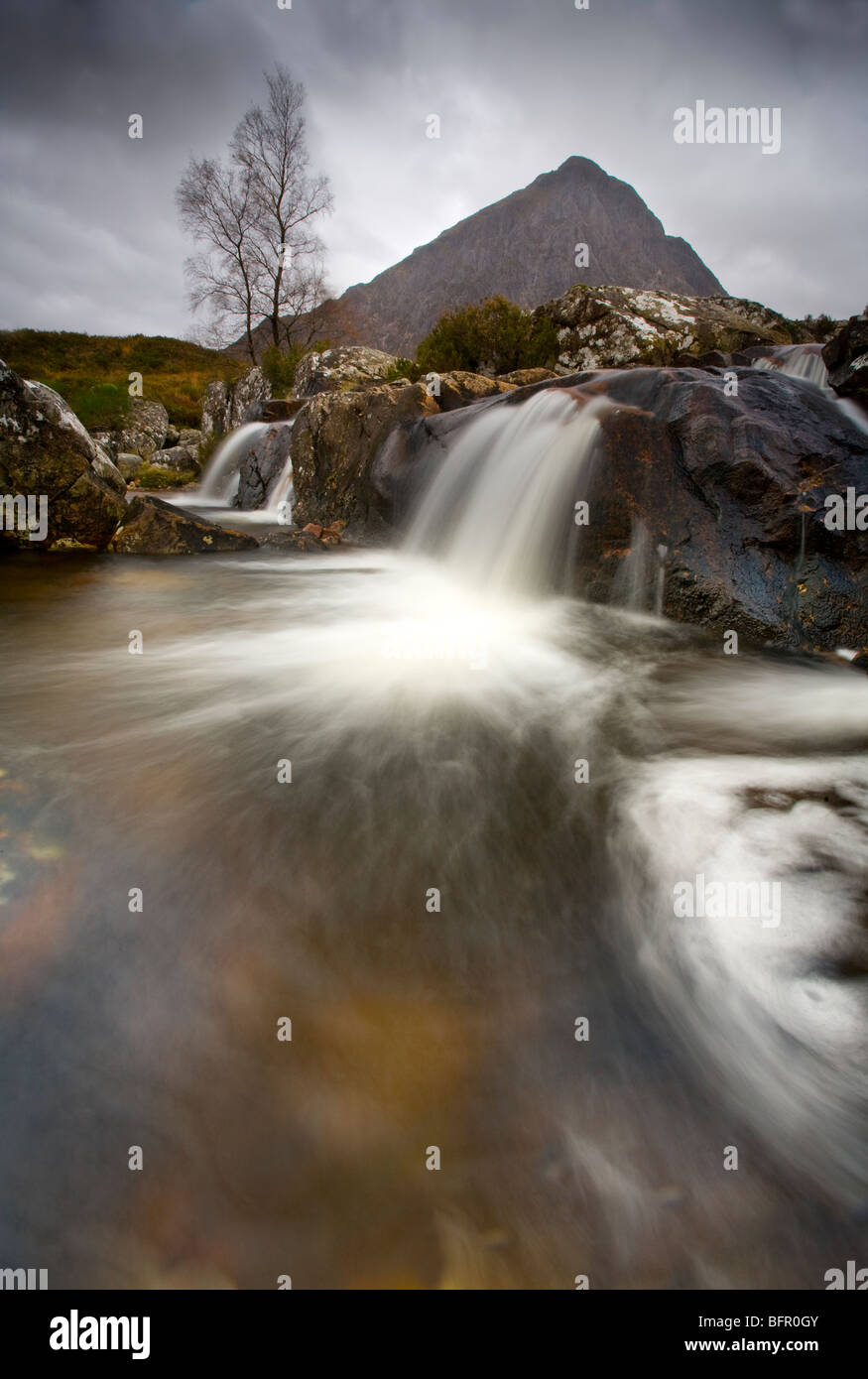 Mountain stream and waterfall Stock Photo - Alamy