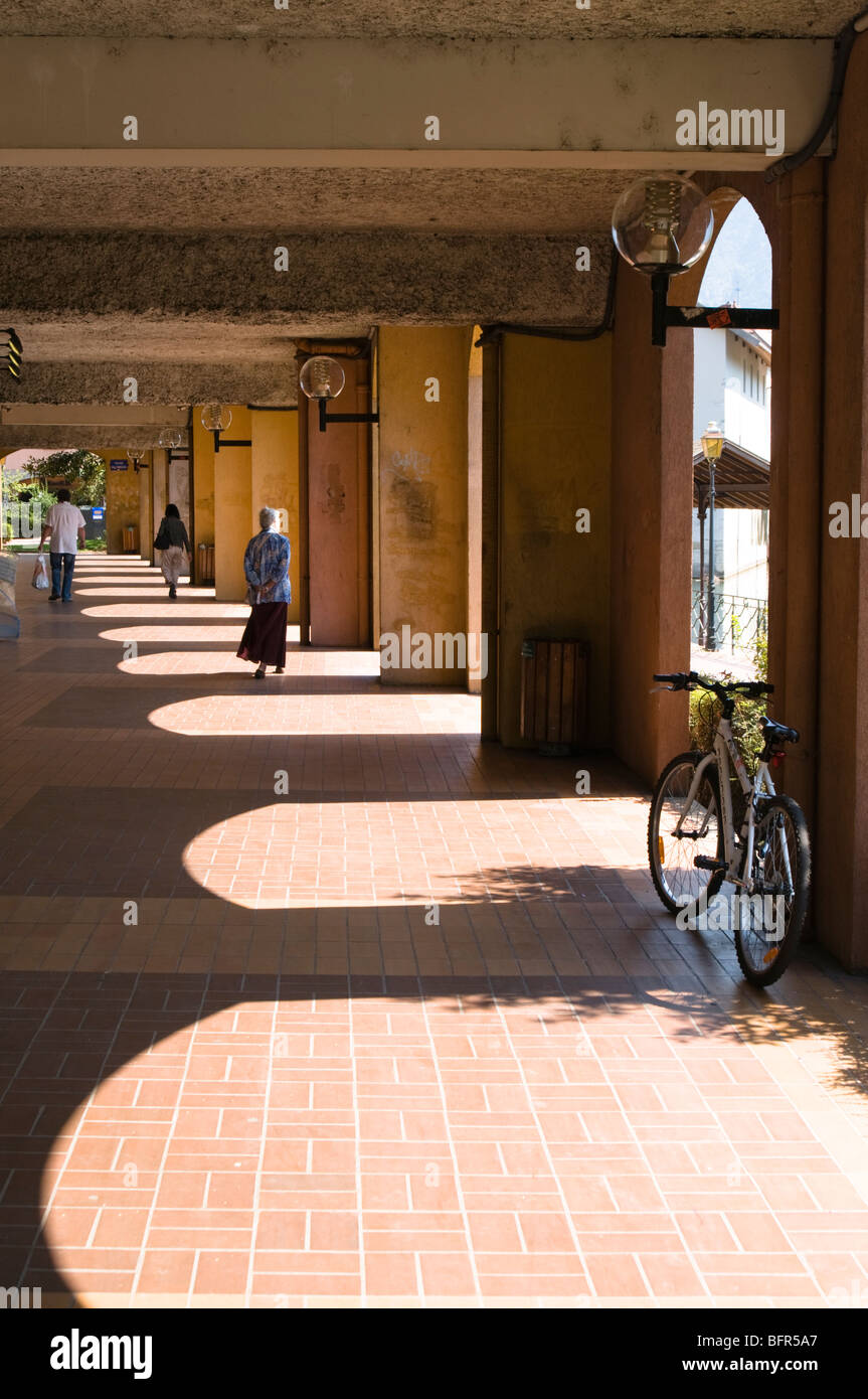 People walking through building, Annecy, Haute Savoie, Rhone Alpes ...