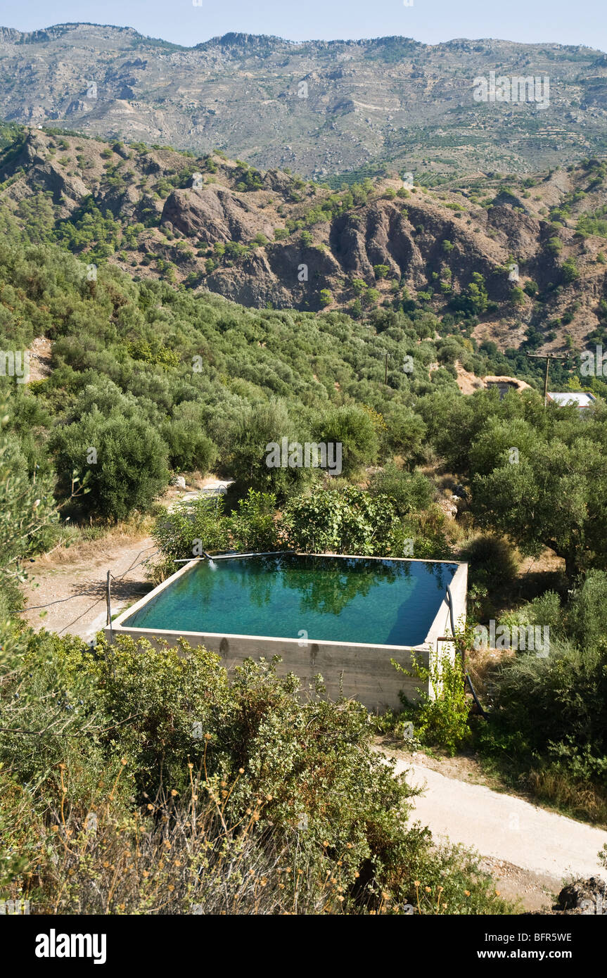 dh Mythi area FARMING GREECE CRETE Irregation water tank above Cretan ...