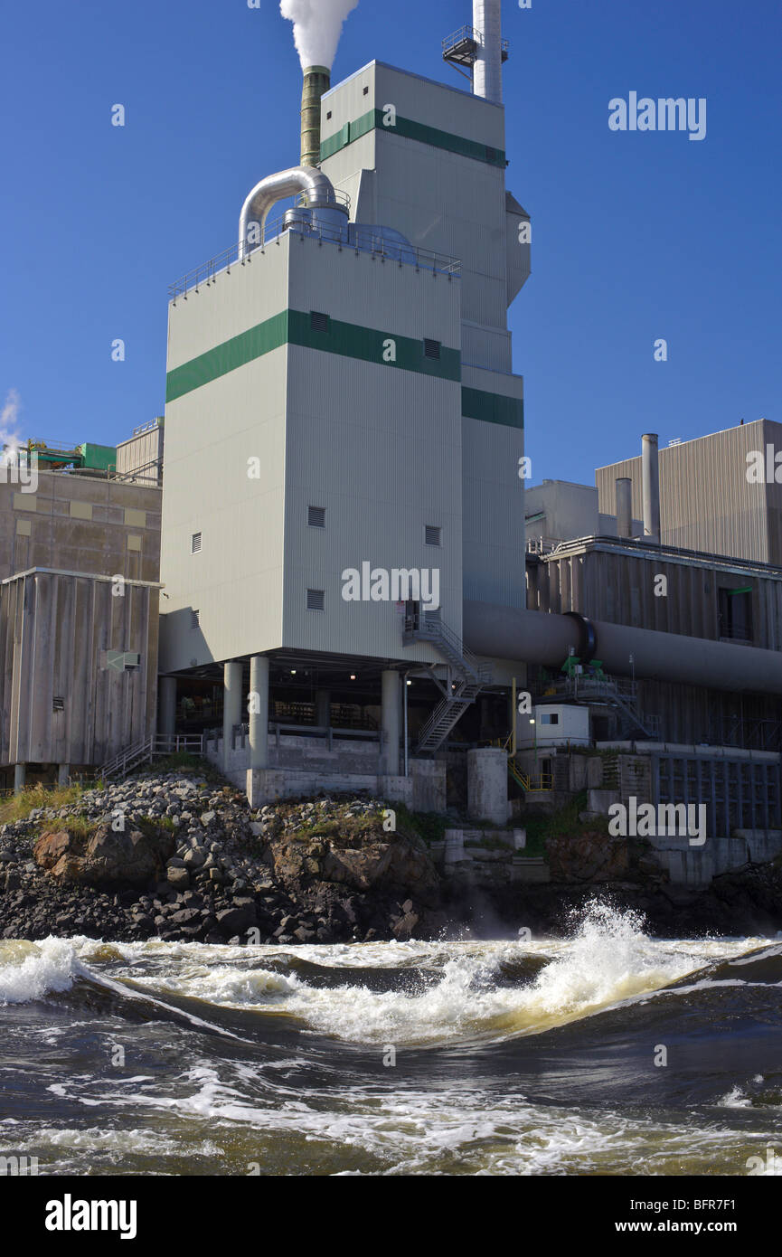 Irving Pulp and Paper mill with reversing falls flowing by on the Saint ...