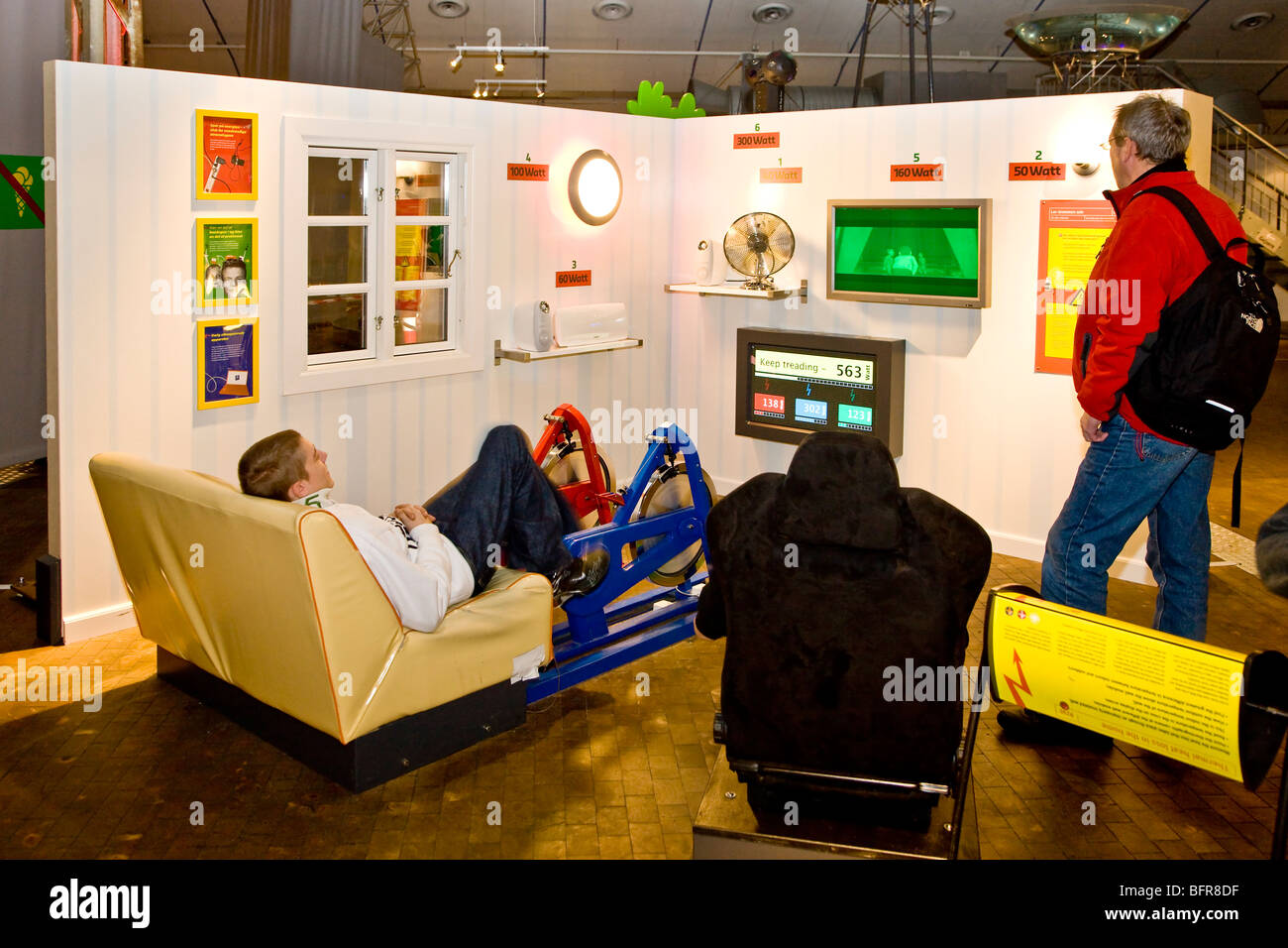 Young people producing energy to electrical appliances Stock Photo - Alamy