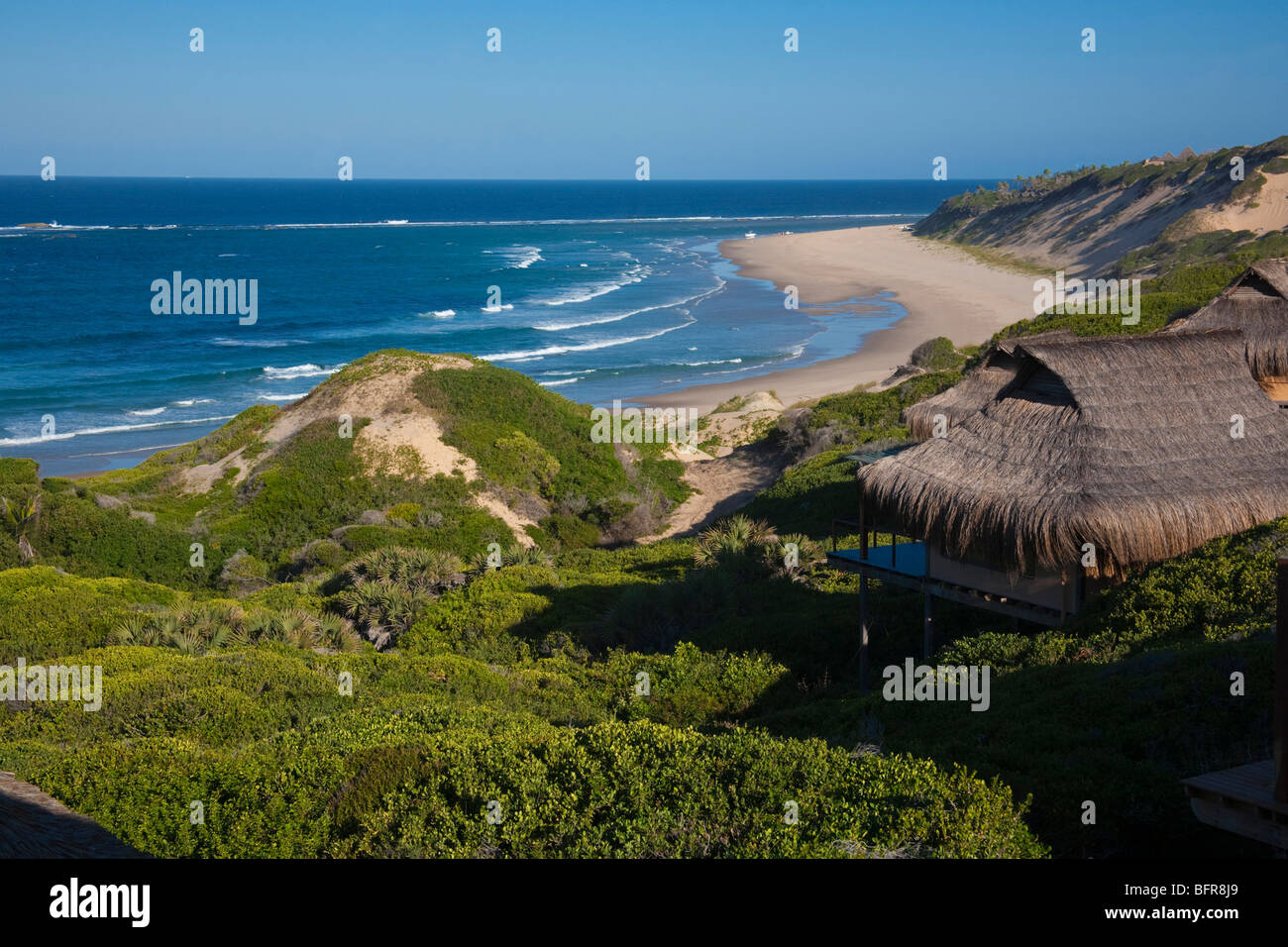 Beach with cottages Stock Photo - Alamy