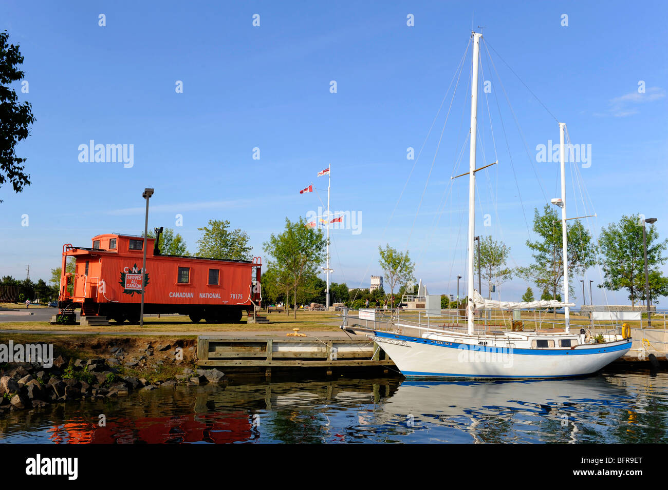 Canadian National Caboose and Sailboat in Harbor Area in Thunder Bay ...