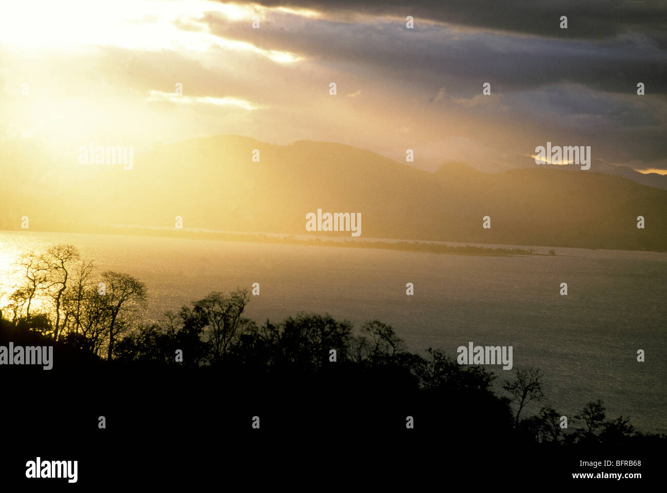 Chicamba dam with bright sunlight shining through the clouds Stock ...