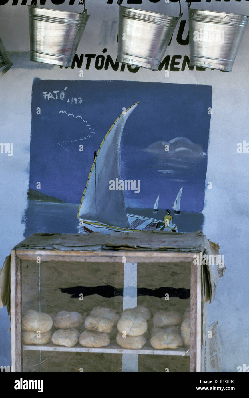 Bread and galvanized buckets for sale at a roadside stall Stock Photo ...