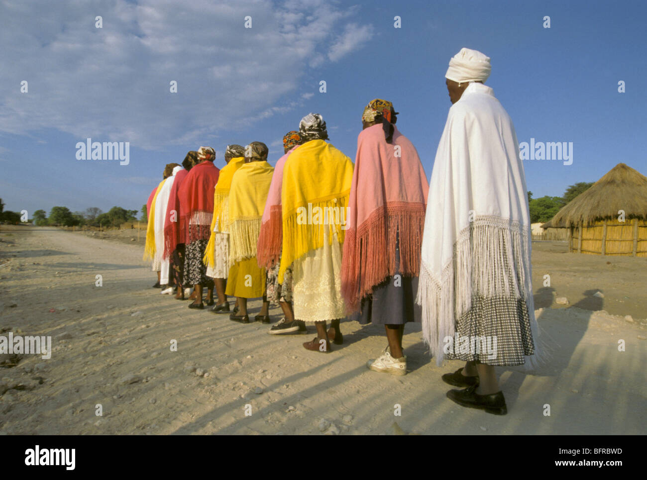 Bayei wedding procession. The brides female friends and relatives lead ...