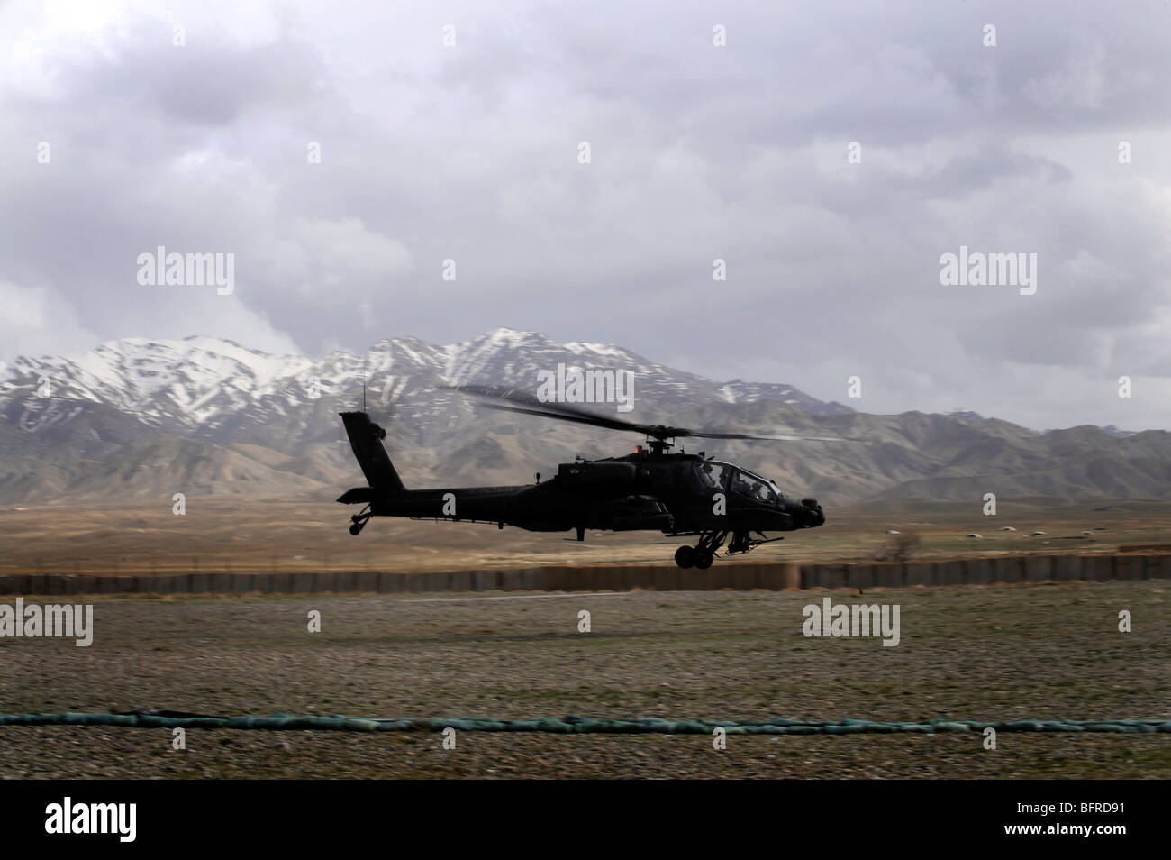 April 12, 2009 - An AH-64A Apache takes off from Forward Operating Base ...