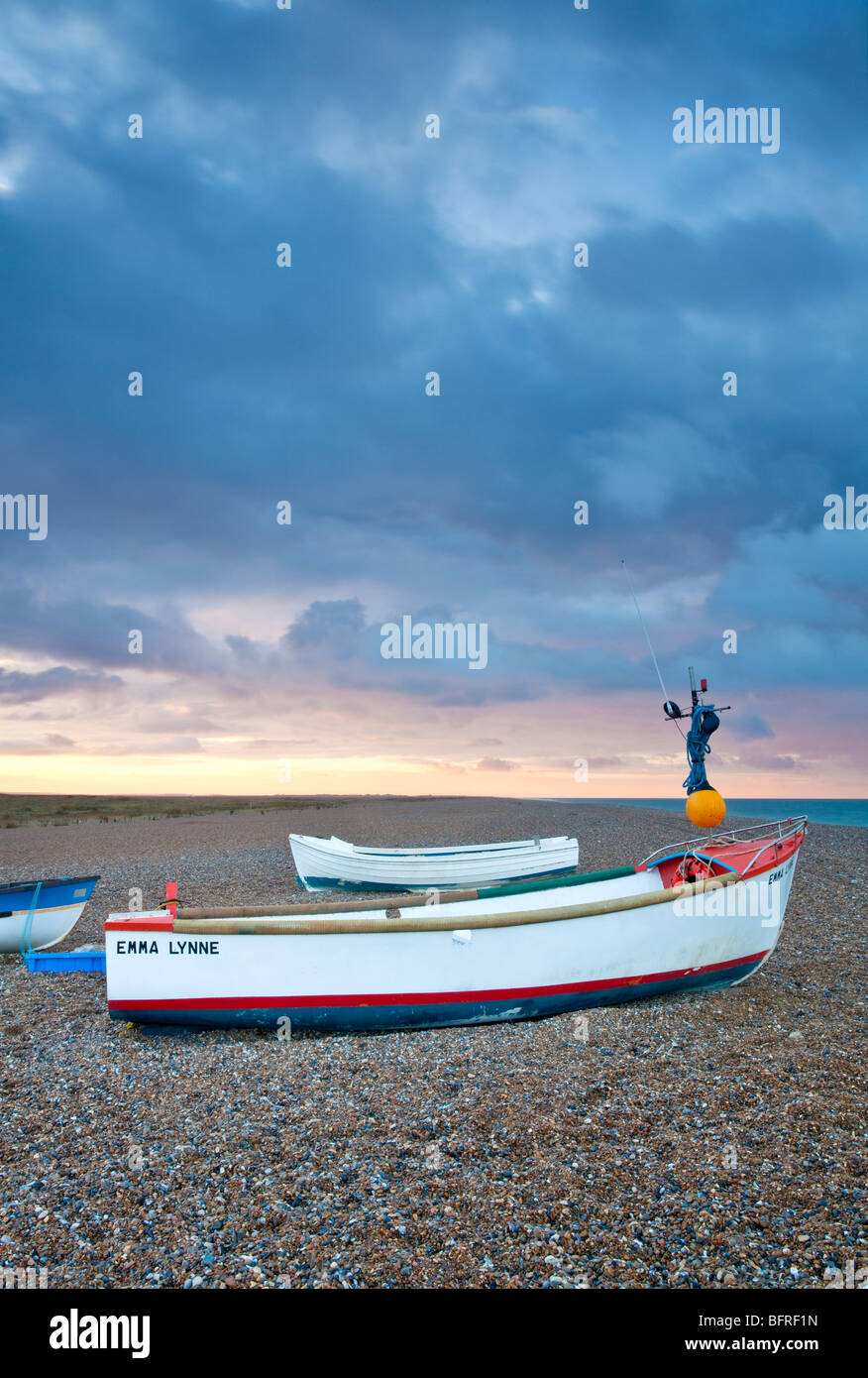 Stormy sunset & fishing boats at Cley beach on the North Norfolk Coast ...