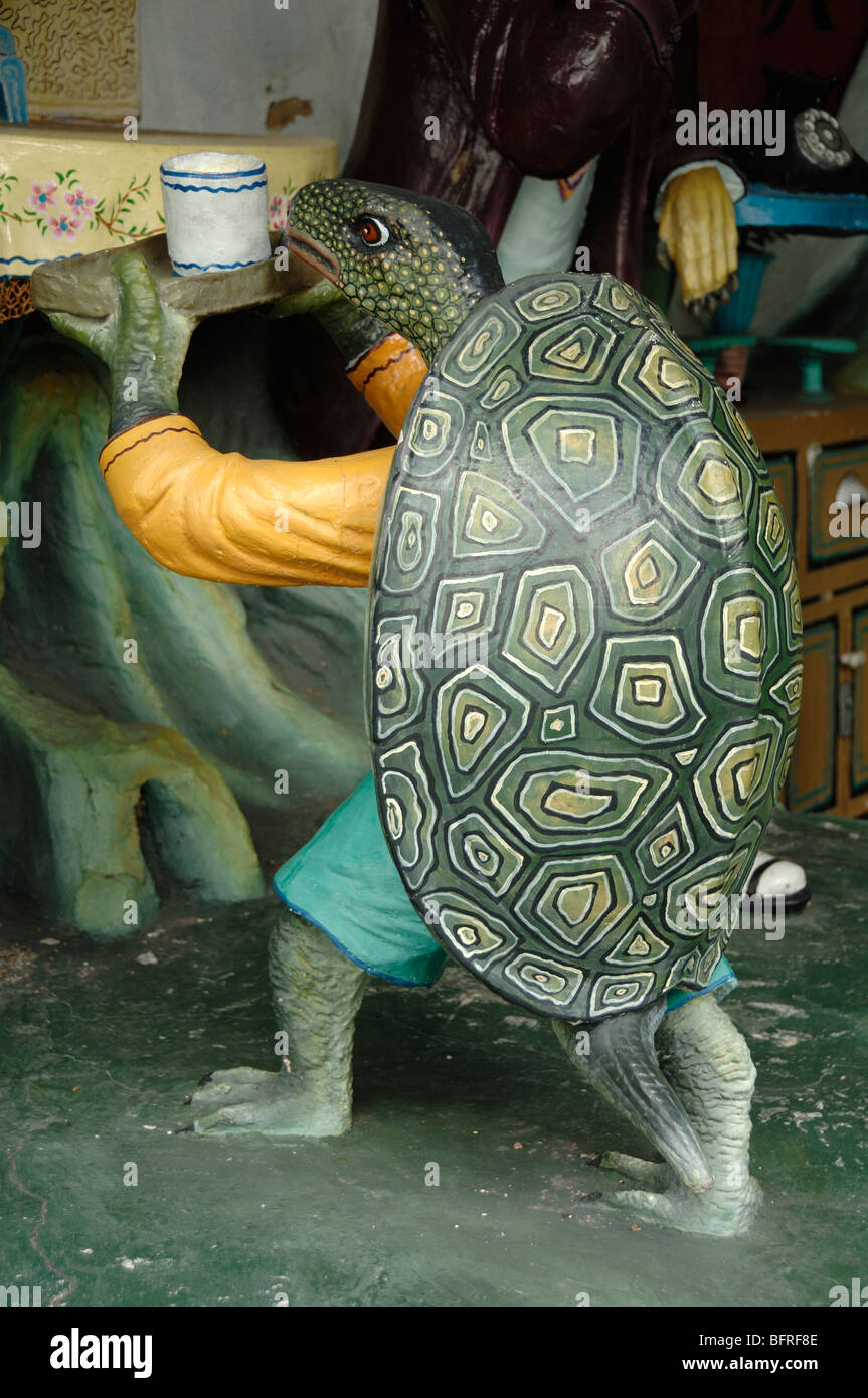 Tortoise Drinking Tea at a Kitchen Table, Tiger Balm Gardens Theme Park ...