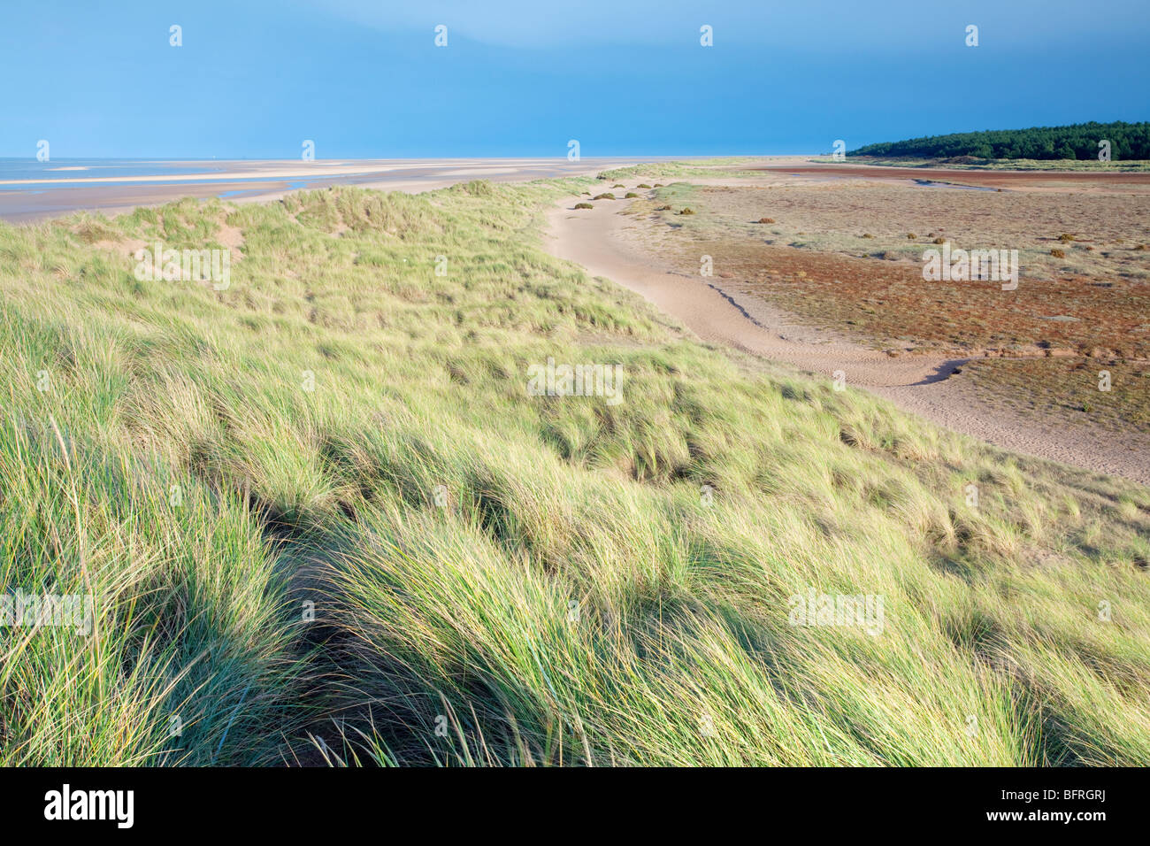 Holkham Bay & sand dunes during a passing storm on the North Norfolk ...